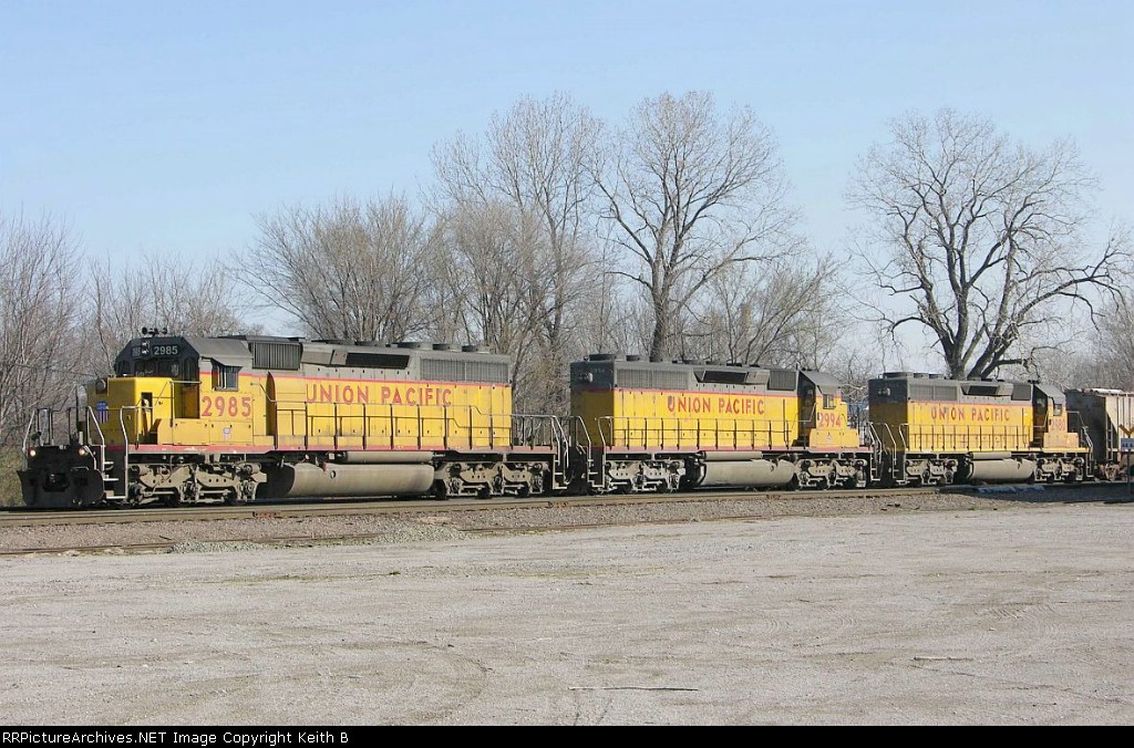 UP 2985 2994 and UP 2980 with a yellow reflective frame stripe